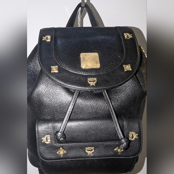 MCM | Bags | Sale Mcm Black Pebbled Calf Leather Drawstring Backpack ...